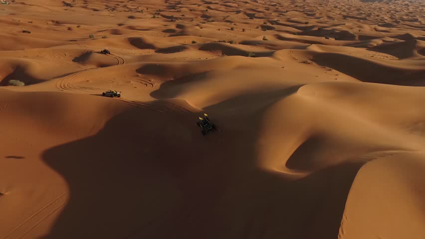 Buggies Drive Through the Desert. Stock Footage Video (100% Royalty ...