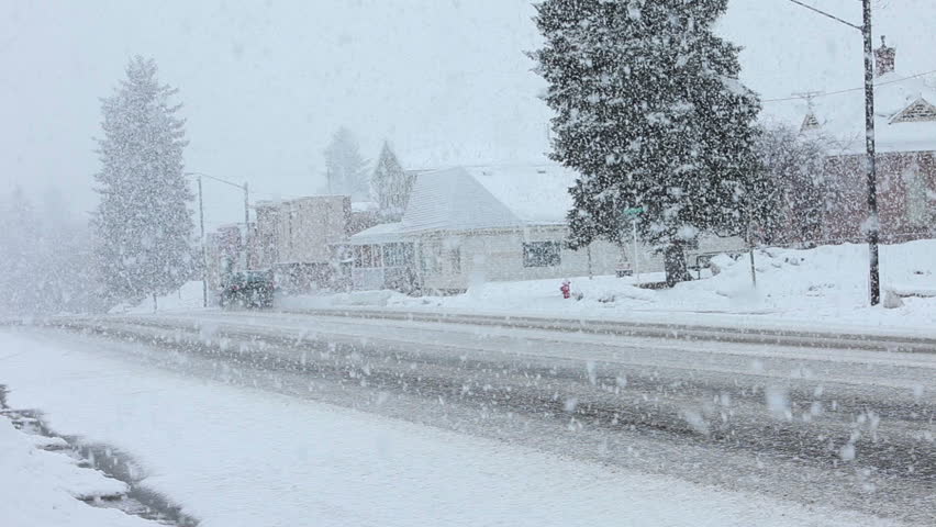 Storm Snow Blizzard Small Rural Town With Cars Drive Through Heavy Snow ...