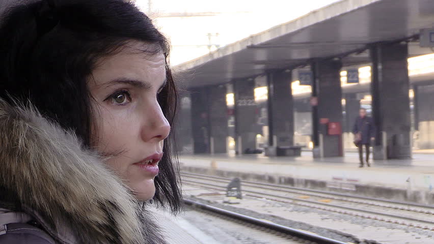 Pensive Sad Woman In The Train Station Waiting To Leave Stock Footage ...