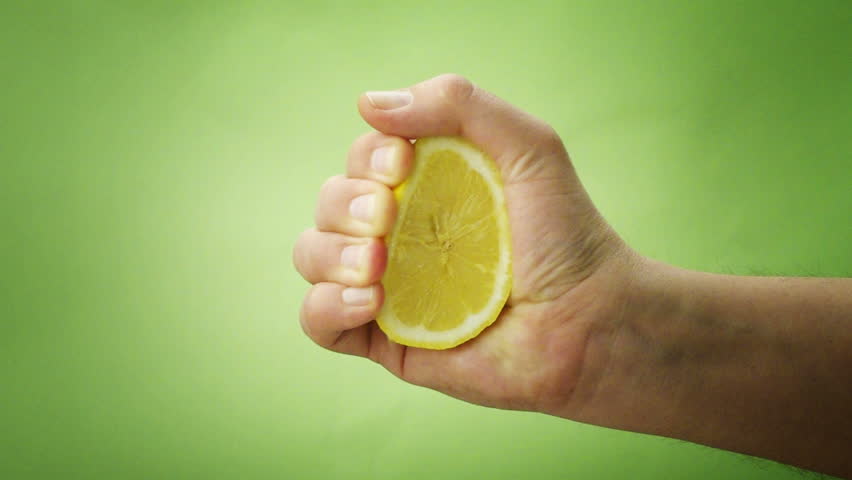 Hand Squeezing Lemon On Green Stock Footage Video (100% Royalty-free ...