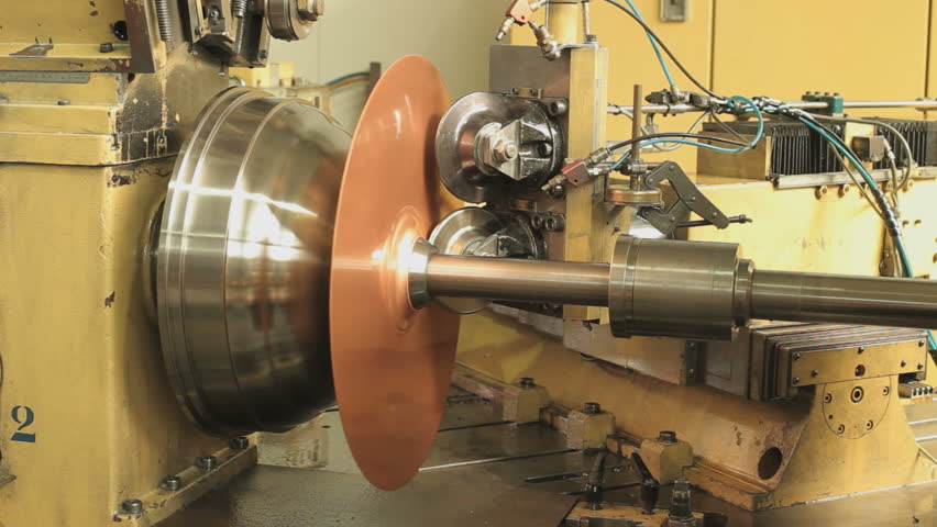 Stock video of producing round parts from brass steel | 11548361 ...