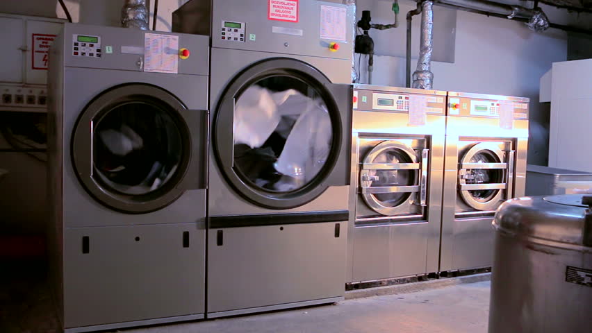 Industrial Washer Dryer Working. Hotel Laundry Service. Clothes Dryer ...
