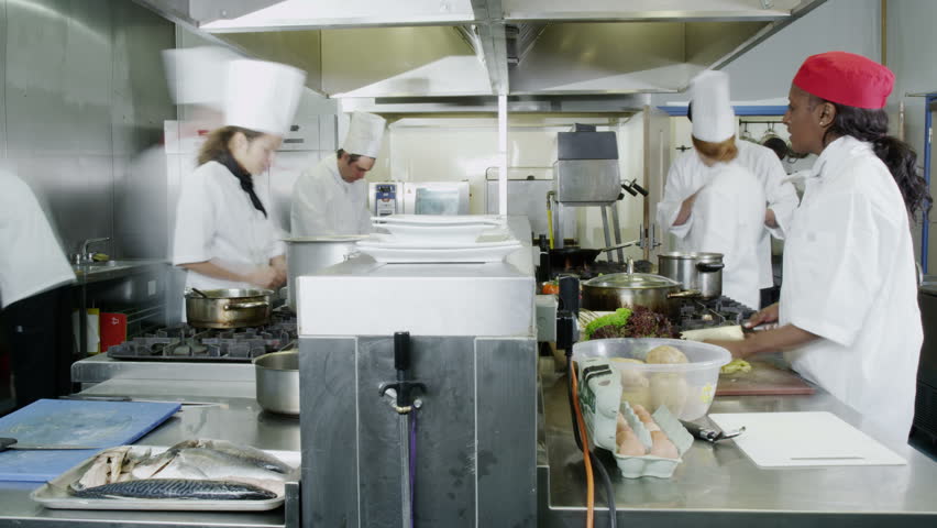 Time Lapse Clip Of A Busy Team Of Chefs, Working Hard And Preparing ...