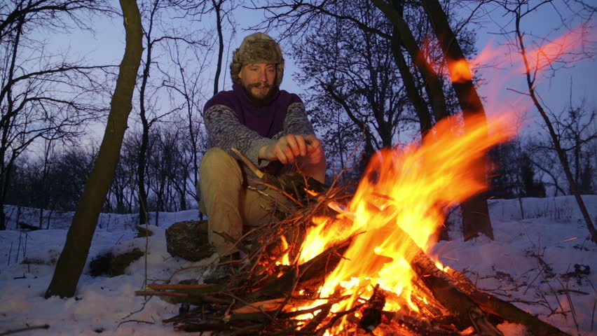 Bearded Man Warming His Hands By The Fire In Winter. Tourist Man ...