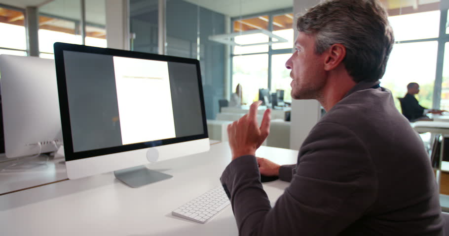 Stock Video Clip of Professional businessman looking at documents and ...