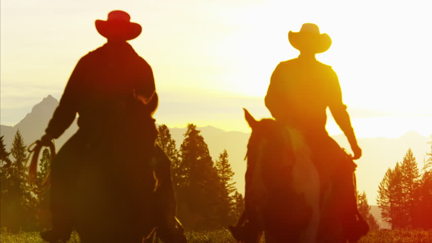 Silhouette Reveal of Cowboy Riders Stock Footage Video (100% Royalty ...