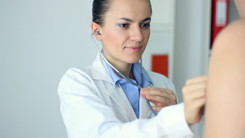 Female Doctor Examining Patient Back With A Stethoscope Stock Footage ...