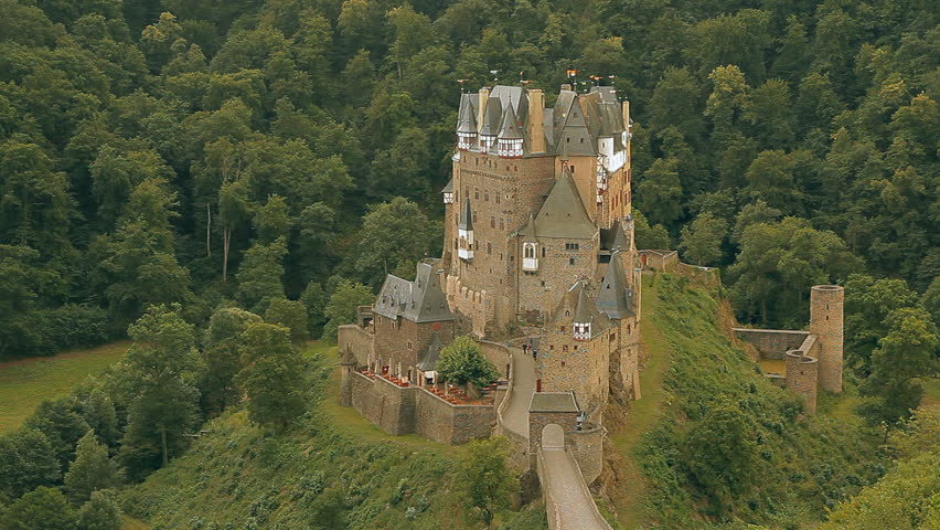 An Ancient Castle Is Majestically Towering On The Mountain. The Castle ...