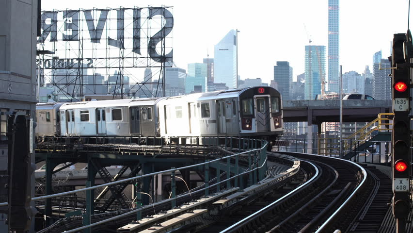 An Outbound Number 7 Train Passes Through Queens At Sunset. New York ...