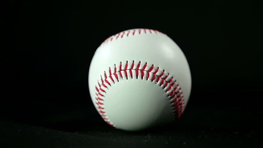 Baseball Spinning On Black Surface In Slow Motion Stock Footage Video ...