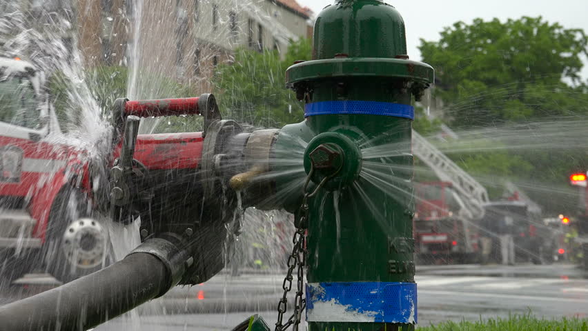 WASHINGTON, DC - MAY 2016: : Leaking Fire Hydrant Sprays Water ...