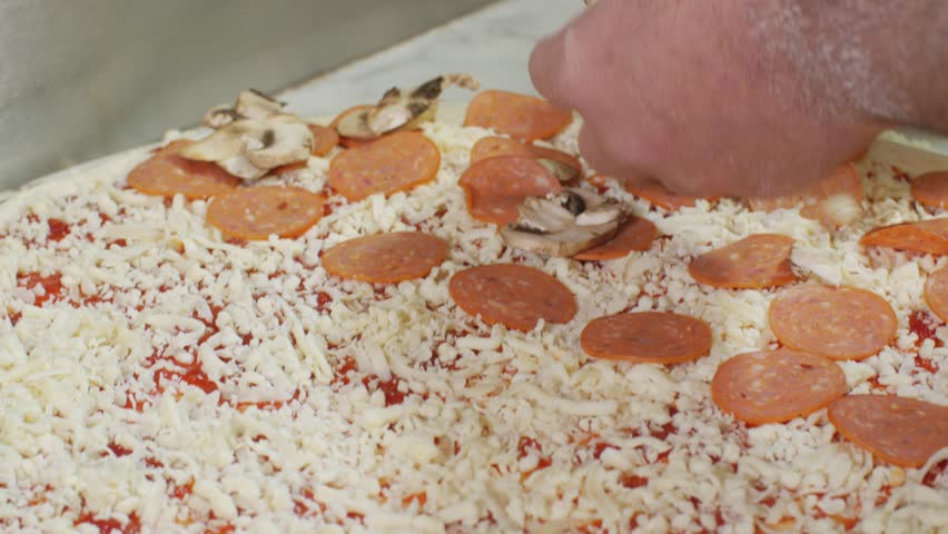 Slow Motion Close-up Of Drooping Slice Of Pepperoni Pizza Cooked In ...