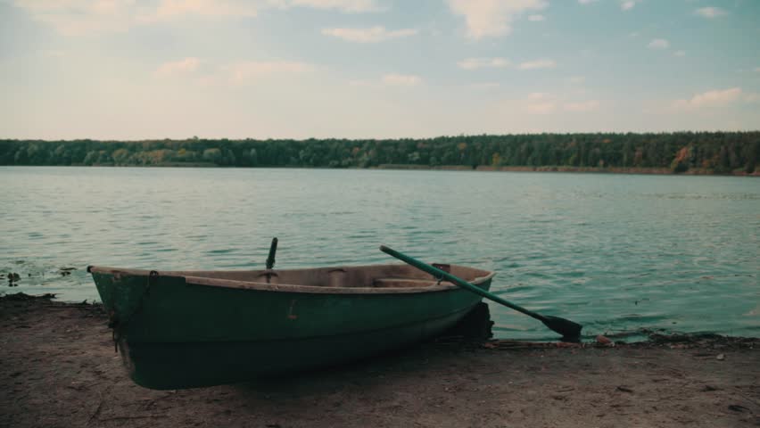 A Logging Boom Boat Is Moored Alongside A Fast Moving River/Boom Boat/A ...