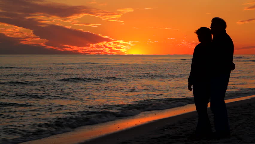 Couple Looking At Sunset
