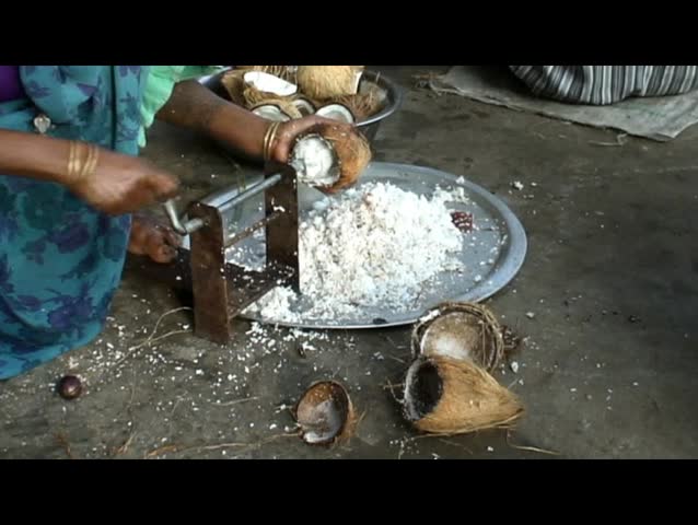 Stock video of grating coconut | 19541 | Shutterstock