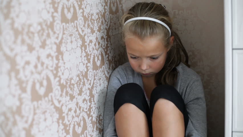 Little Girl Crying In The Corner. Domestic Violence Concept. Stock ...