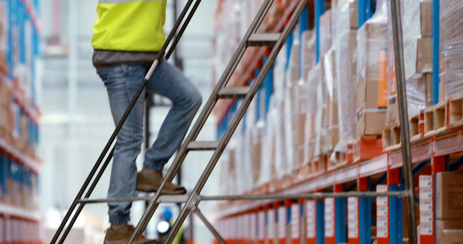 Male Warehouse Worker Using Ladder Stock Footage Video (100% Royalty ...