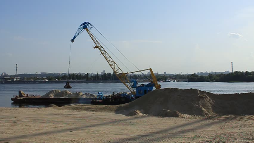 Stock video of an industrial crane loading a barge | 2113661 | Shutterstock