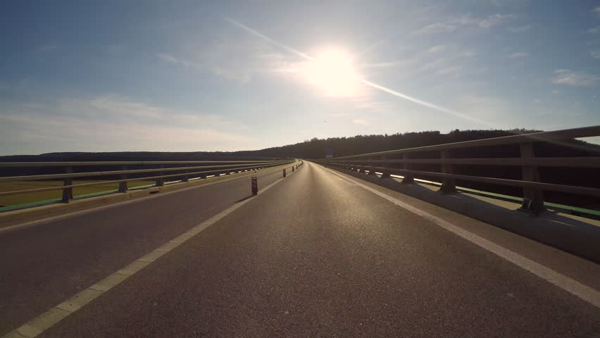 Time-lapse Of Driving Down A Highway At Sunset Filmati e video d ...