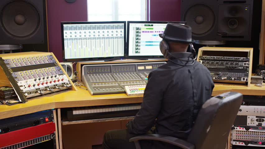 4K Music Producer & Sound Engineer Working Together In Recording Studio ...