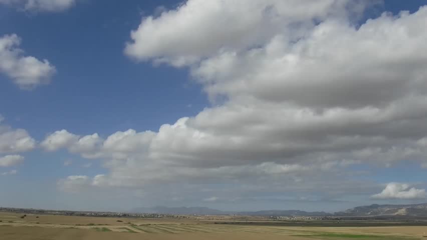 Rain Clouds Flying On Blue Sky Over Field. White And Gray Clouds Flying ...