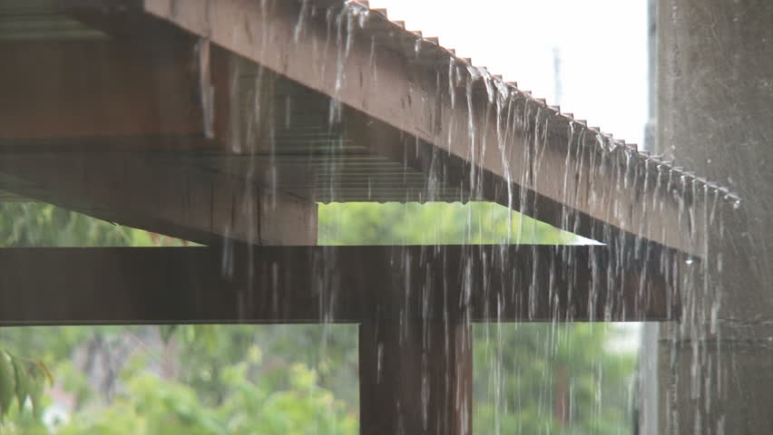 Stock video of rain water flowing from a roof | 2491571 | Shutterstock