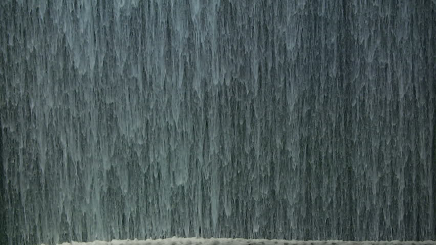 Modern Fountain. Water Waves Intermittently Flow Down The Texture ...