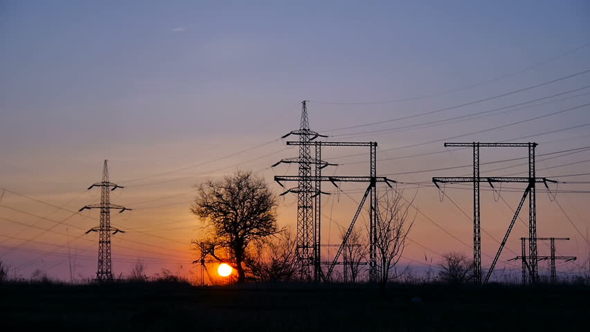 Energy Transmission Power Line Tower Pylon Structures At Sunset. Power ...