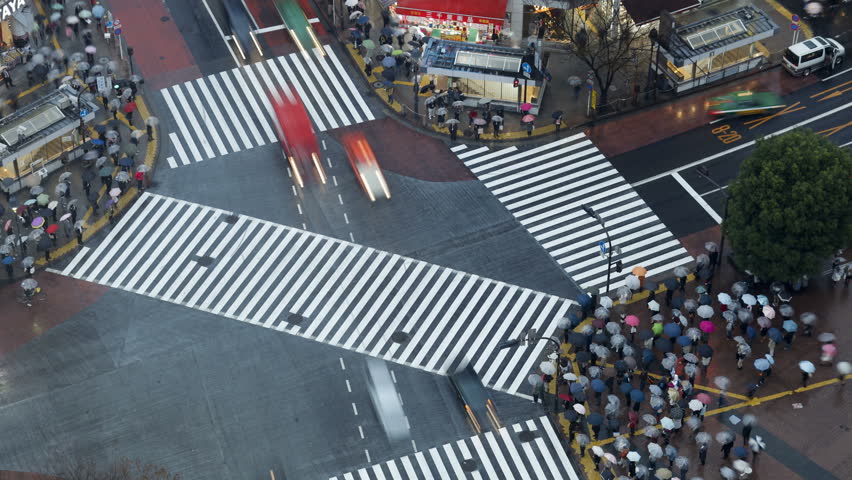 High Angle Shot Pedestrians And Traffic Across Shibuya Crossing ...