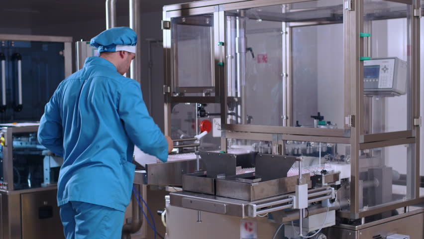 Pharmacist Control Pharmaceutical Manufacturing Process At Drug Factory ...