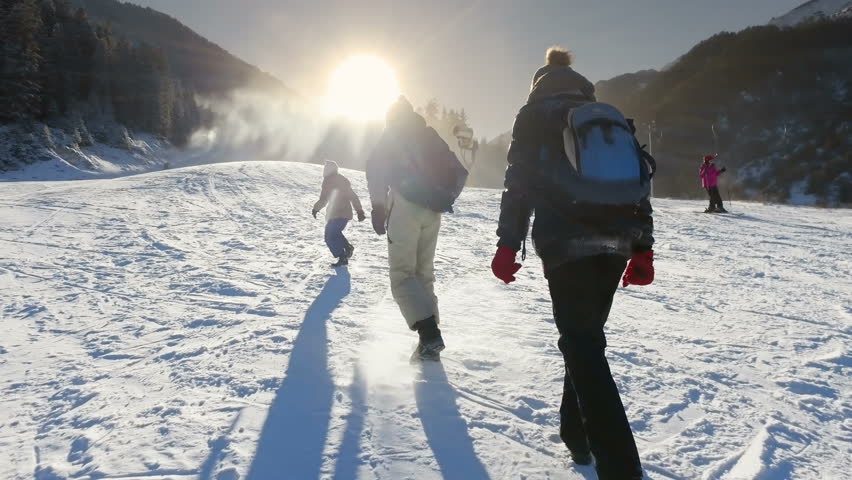 Hikers Walking In The Snow. Expedition Journey. Foot Feet Steeps. Snow ...