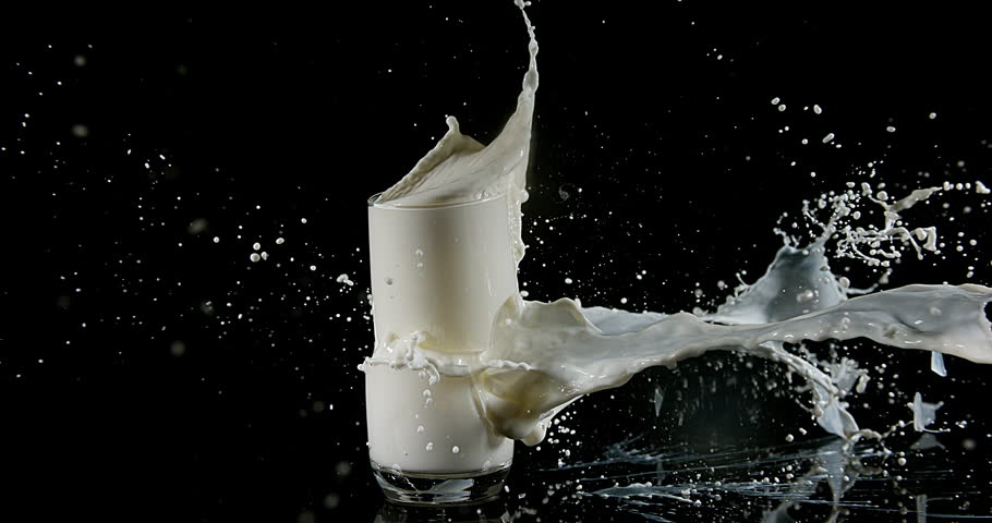 Glass of Milk Exploding Against Stock Footage Video (100% Royalty-free ...