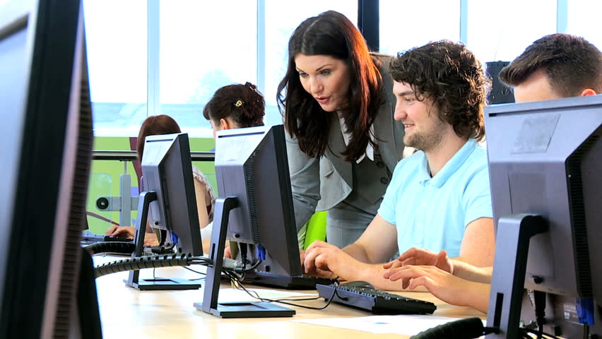 IT Teacher Learning Online On Computer University Male And Female ...