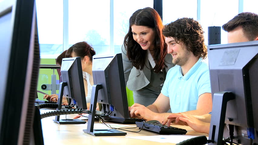 IT Teacher Learning Online On Computer University Male And Female ...