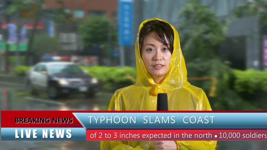 Asian American Female TV Weather Reporter Reporting On Typhoon With ...