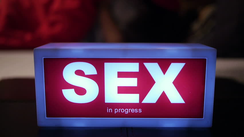 Woman Approaching Man In Bed Sex Sign In Foreground Stock Footage Video
