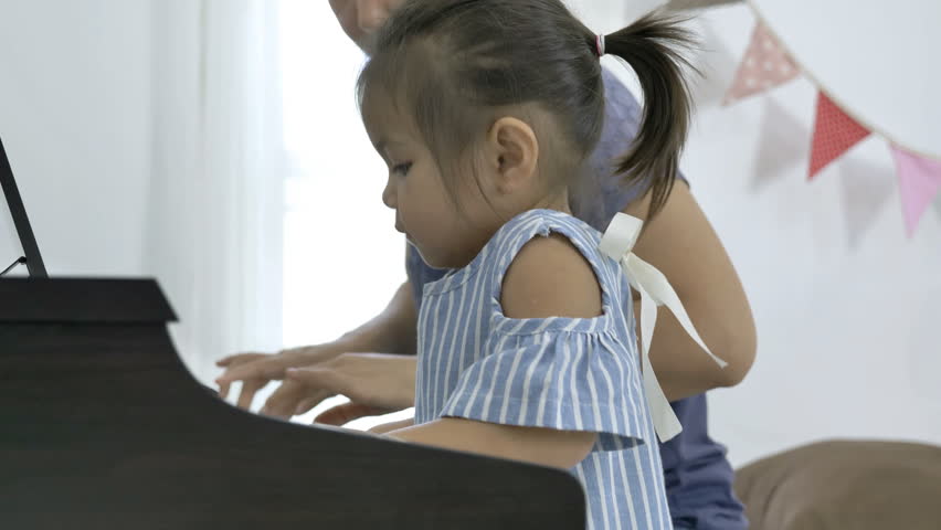 Asian Kids Playing Instruments Stock Video Footage - 4K and HD Video ...