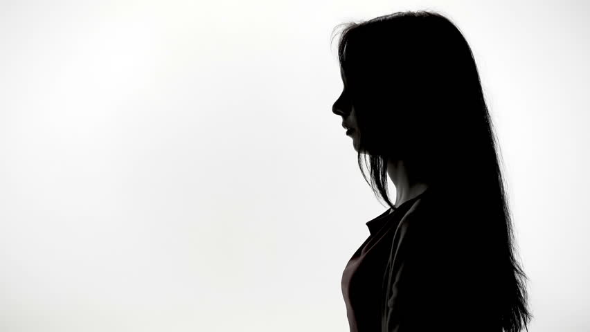 Stock Video Clip of Young woman looking forward in profile | Shutterstock