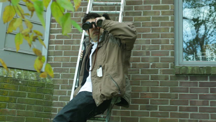 Stock Video Of Peeping Tom With Binoculars Looking On 3021421