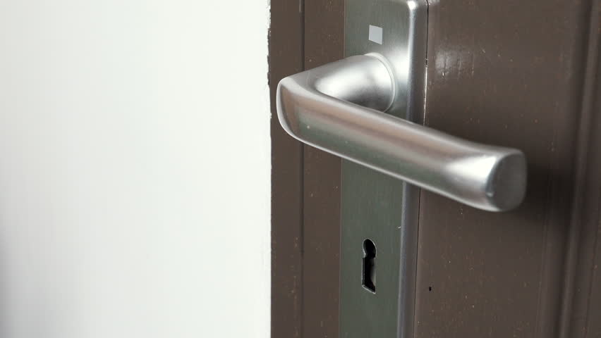 Key Unlocking Lock And Door Opening To A Bright Light. HD 1080. Alpha ...