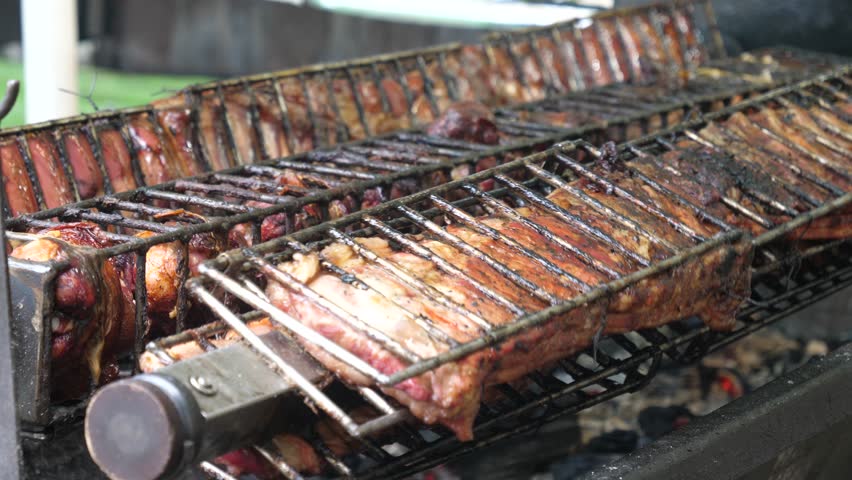 Meat Spinning On Spit Cooking Stockowy materiał wideo (100% ...