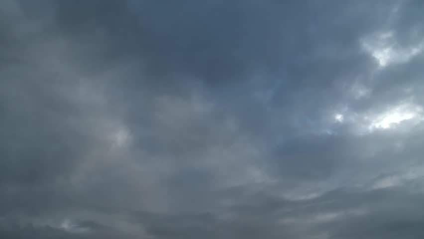Clouds: Time Lapse Misty Rain Clouds Float Across A Slate Blue Sky ...