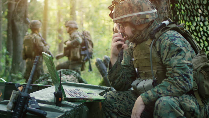 Military Staging Base, Chief Army Engineer/ Signalman Uses Walkie ...