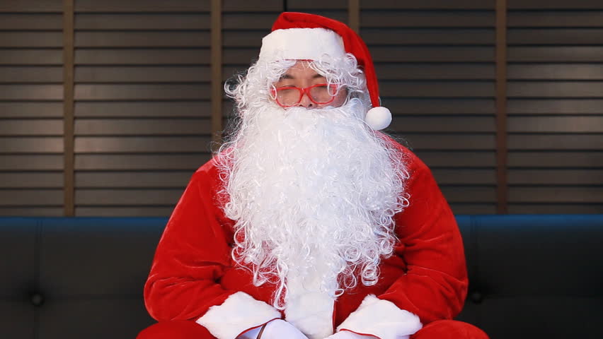 Close Up Of Santa Claus Against Black Background Clapping Hands In The ...