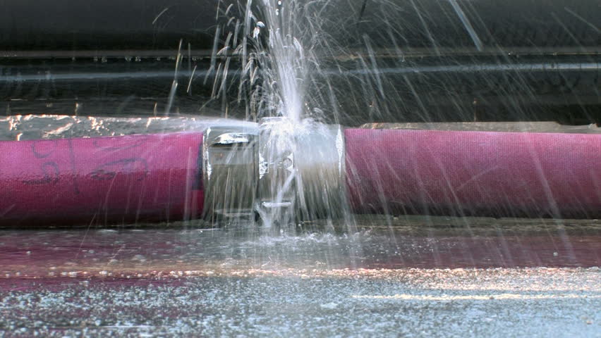 Stock Video Clip of Red Fire Hose Leaking | Shutterstock
