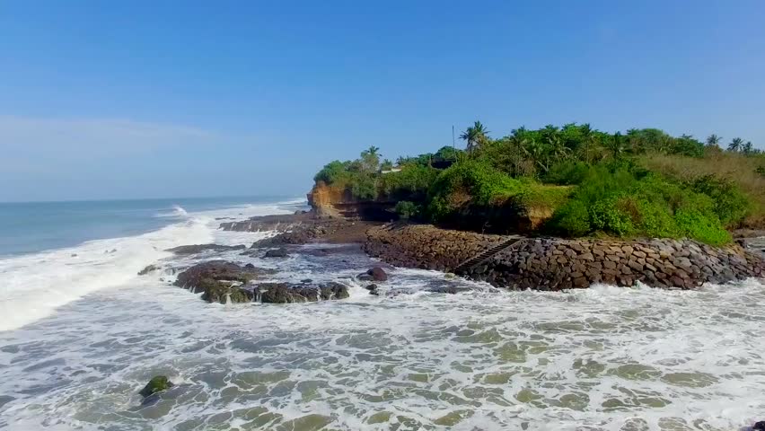 Red Cliffs With Palm Trees And Surf, A Beach In Edava Village, Near ...