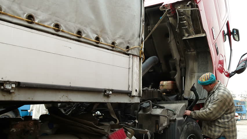 Stock video of auto mechanic or driver repairing diesel | 3652421 ...