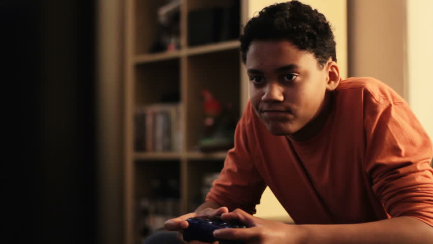 Stock video of console gaming - a teenage boy | 3797531 | Shutterstock