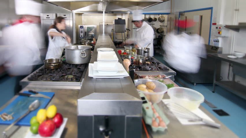 Time Lapse Clip Of A Busy Team Of Chefs, Working Hard And Preparing ...