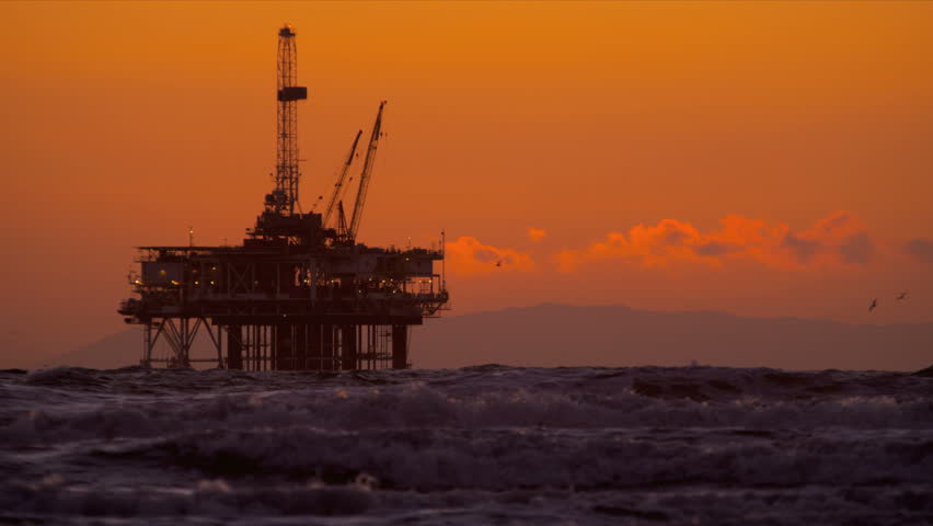 Offshore Coastal Oil Drilling Rig Producing Unrefined Fuel Sunset ...